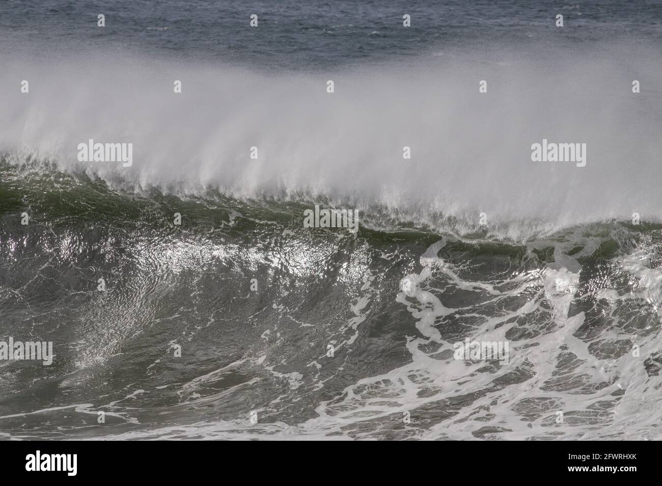 Big breaking wave with wind spray. Near Leixoes harbor north wall ...