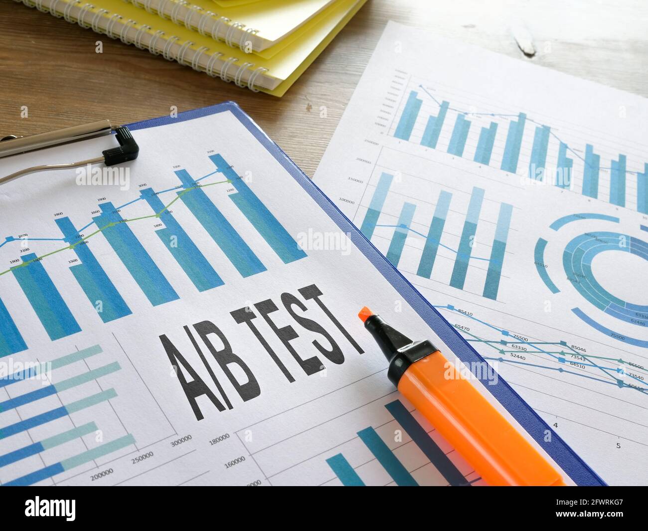 Stack of papers with Ab test results report for business Stock Photo ...