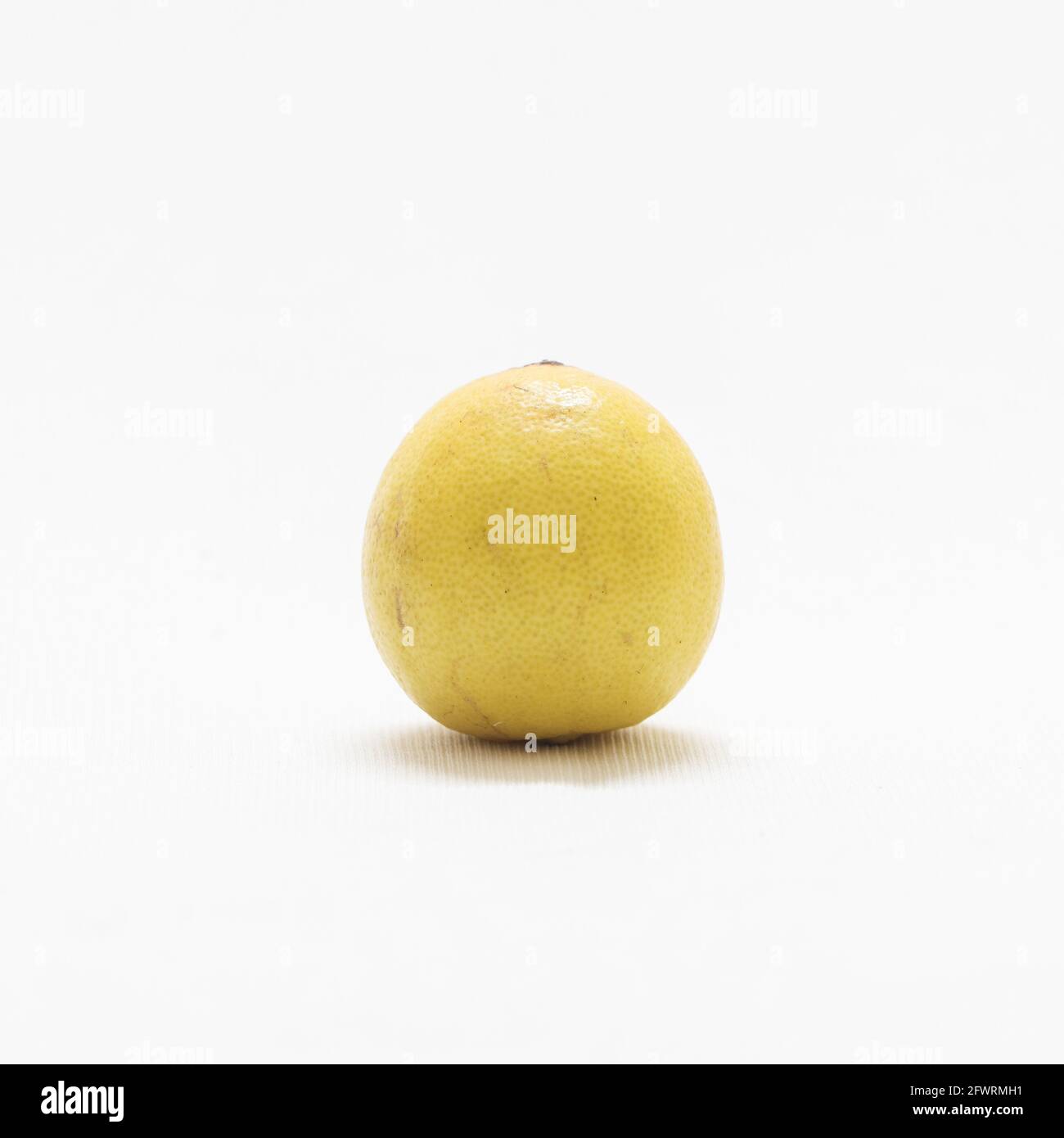 yellow ripe fresh juicy lemon fruit in a white background Stock Photo ...