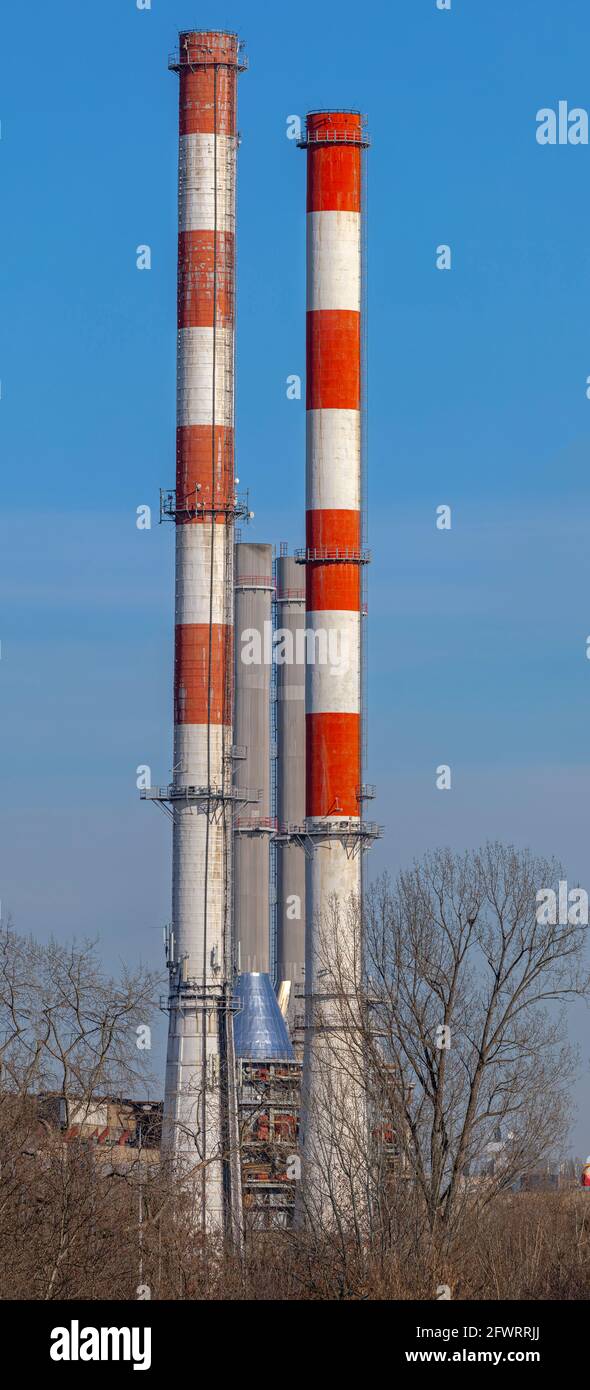 Tall Red and White Chimneys at Industrial Plant Stock Photo - Alamy