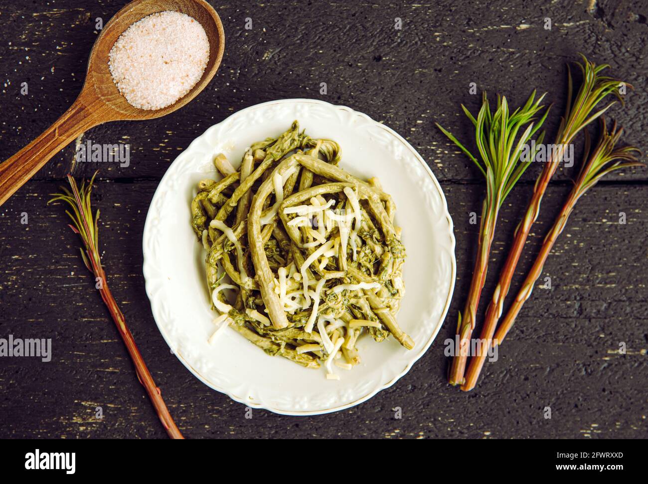 Above view of young fireweed plant boiled and fried with butter and ...