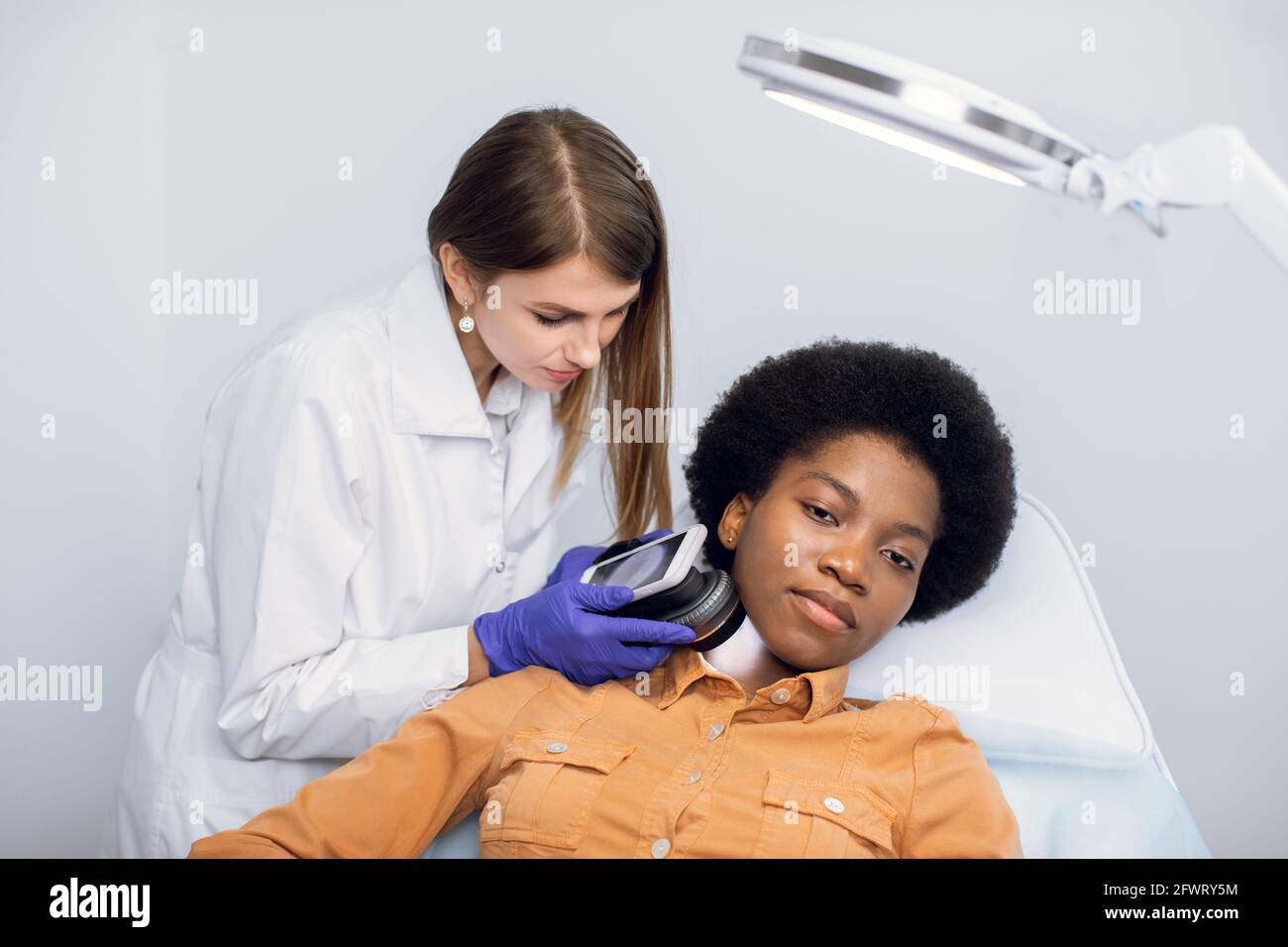 Dermatologist skin exam hi-res stock photography and images - Alamy