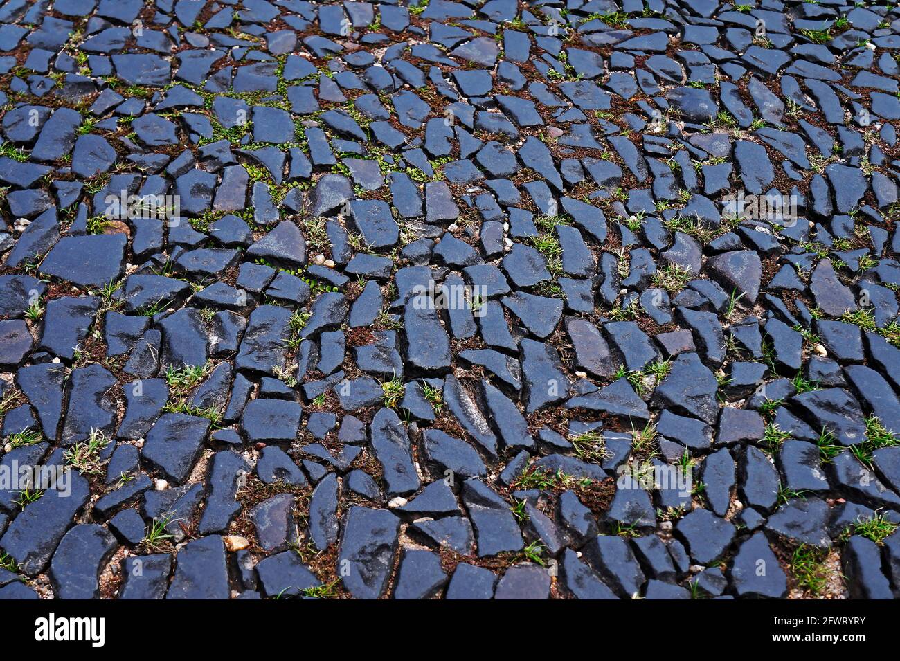 Typical ancient paving stones at historical city of Sao Joao del Rei ...