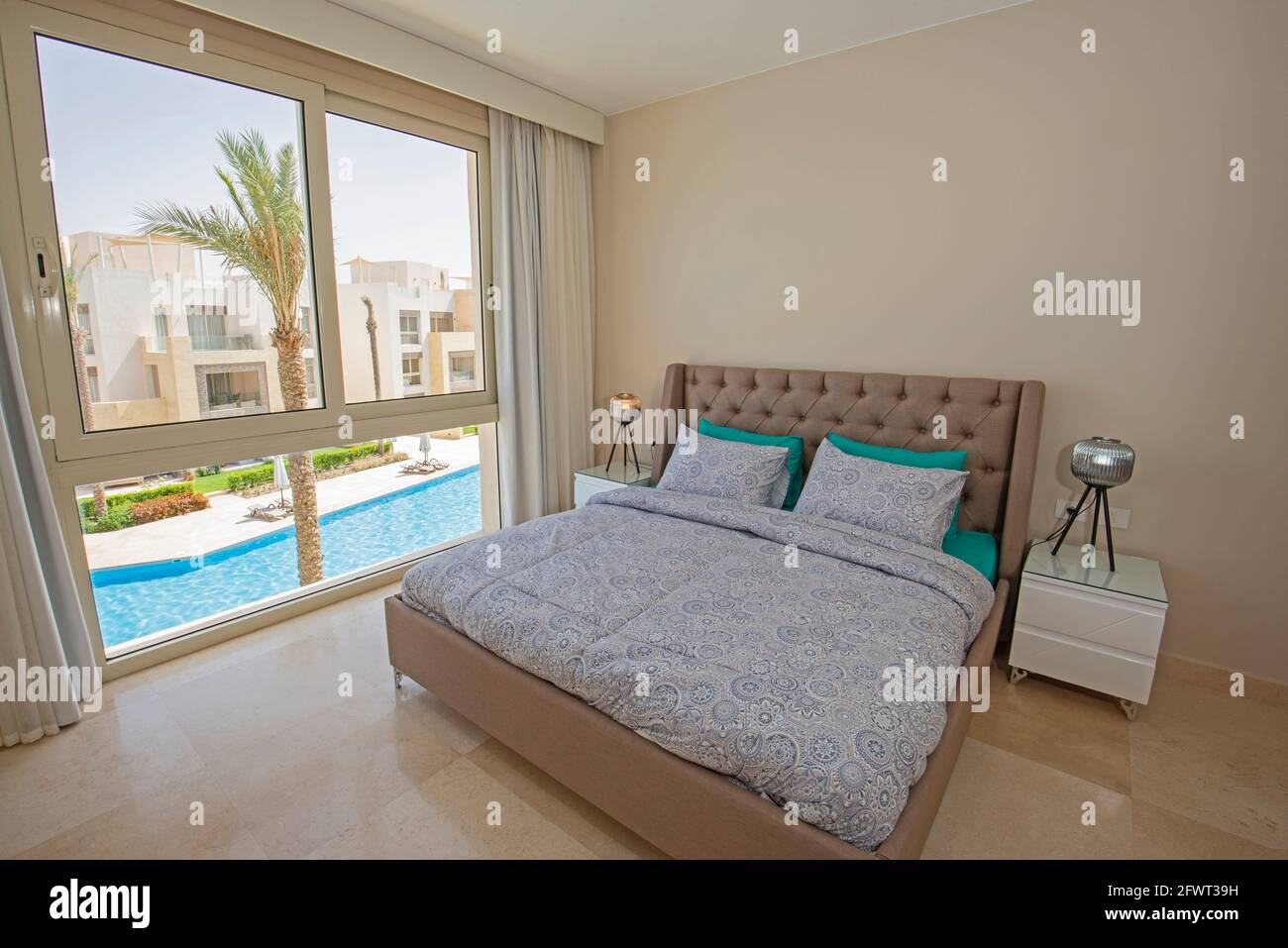 Interior design decor furnishing of luxury show home bedroom showing ...