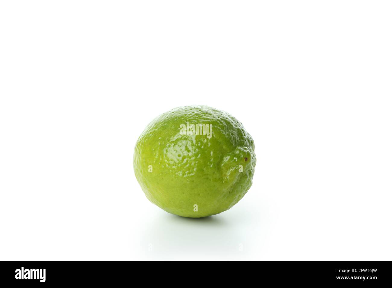 Fresh single lime isolated on white background Stock Photo - Alamy