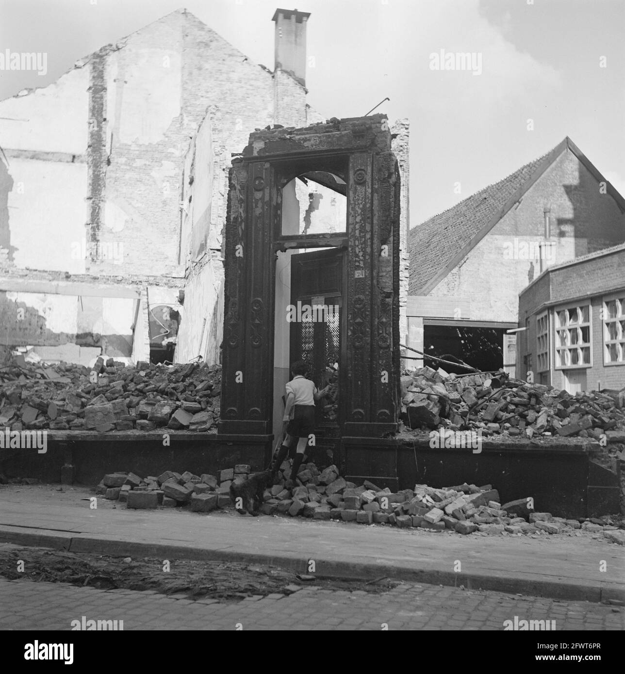 [Only one front door remains of a destroyed building], June 1945 ...