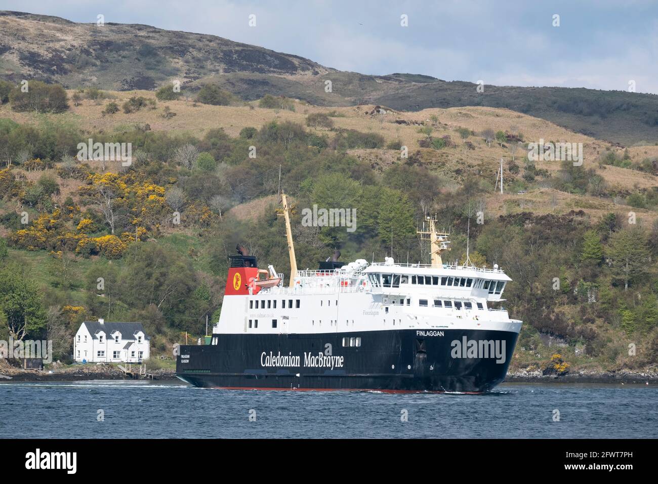 The Caledonian Macbrayne ferry MV Finlaggan departs Port Askaig Isle of ...
