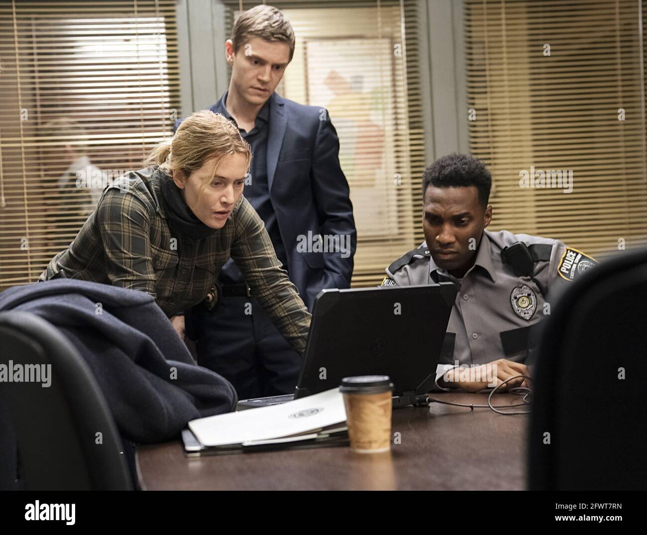 USA. Kate Winslet, Evan Peters, and Justin Hurtt-Dunkley in the (C)HBO ...