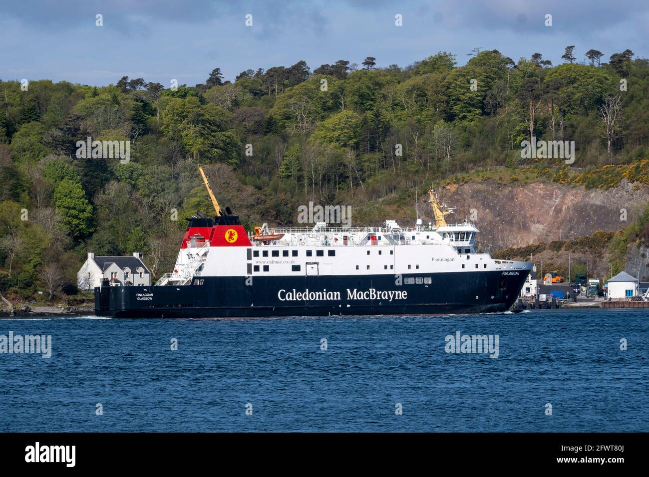 The Caledonian Macbrayne ferry MV Finlaggan departs Port Askaig Isle of ...