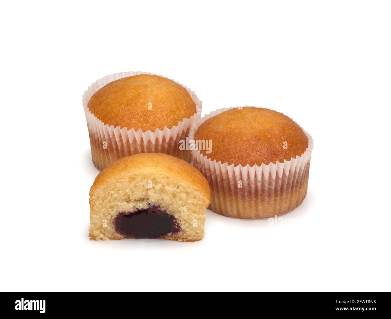Two muffins and a half on white background, close up Stock Photo - Alamy