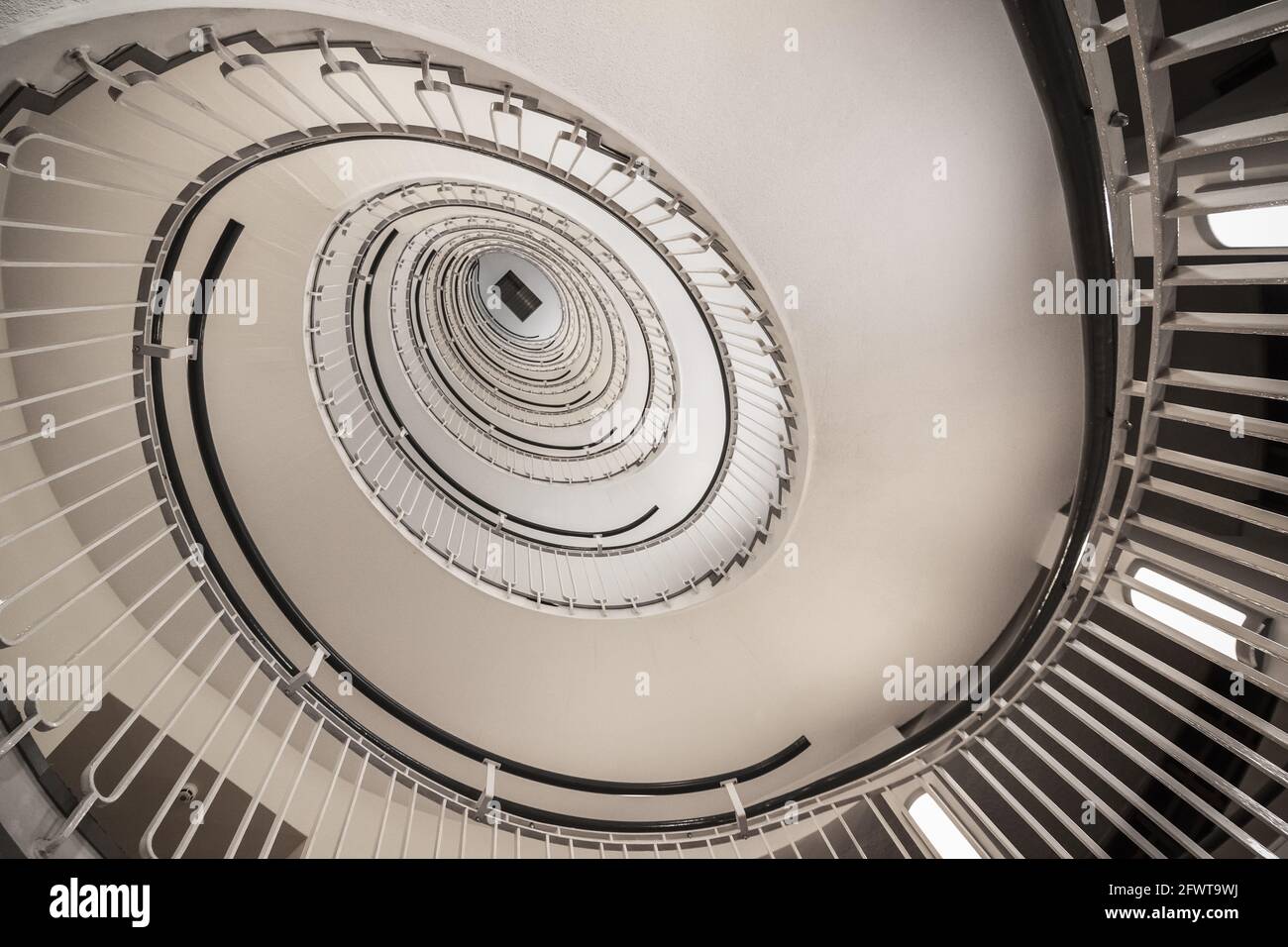 Architectural abstract, upside view of a spiral staircase in the ...