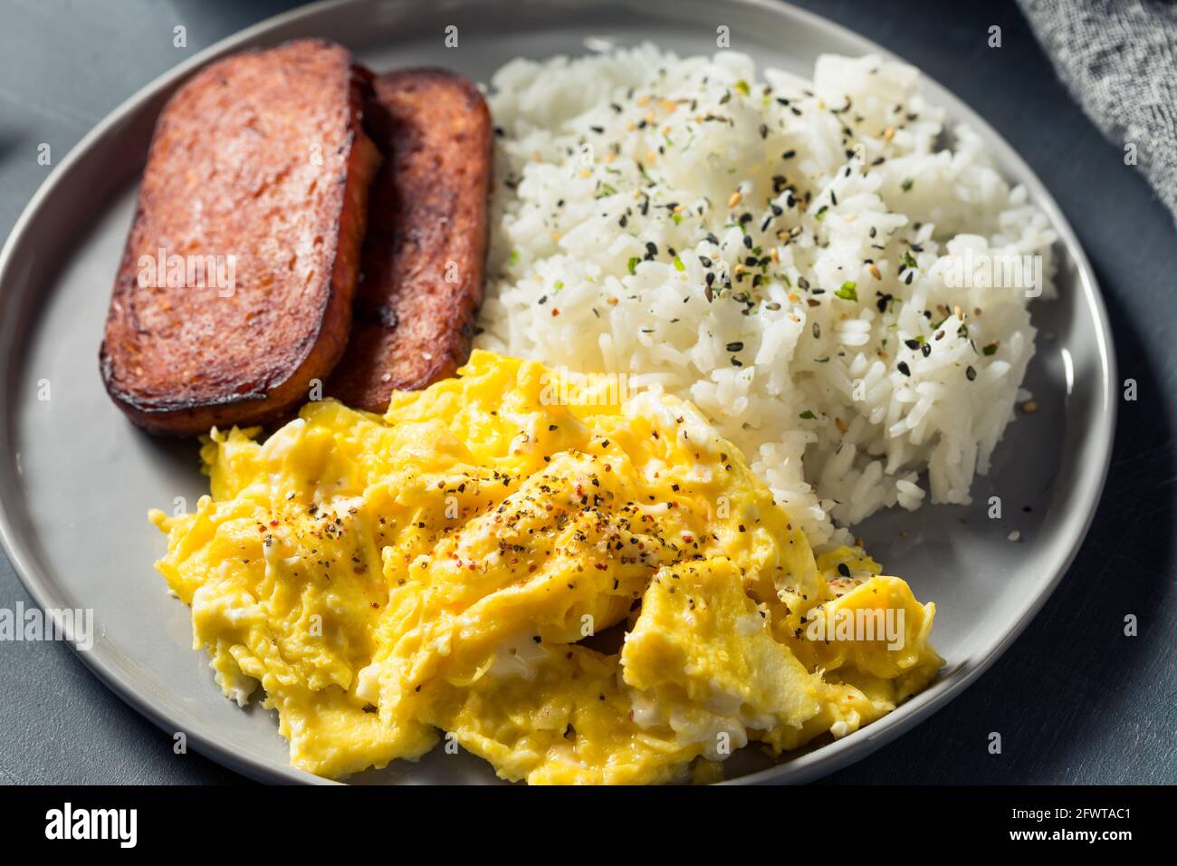 Homemade Hawaiian Egg Breakfast with Ham and Rice Stock Photo - Alamy