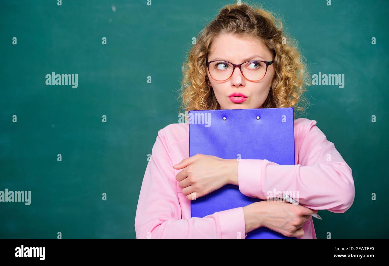 essay writing. teacher with document folder. girl teacher at private ...