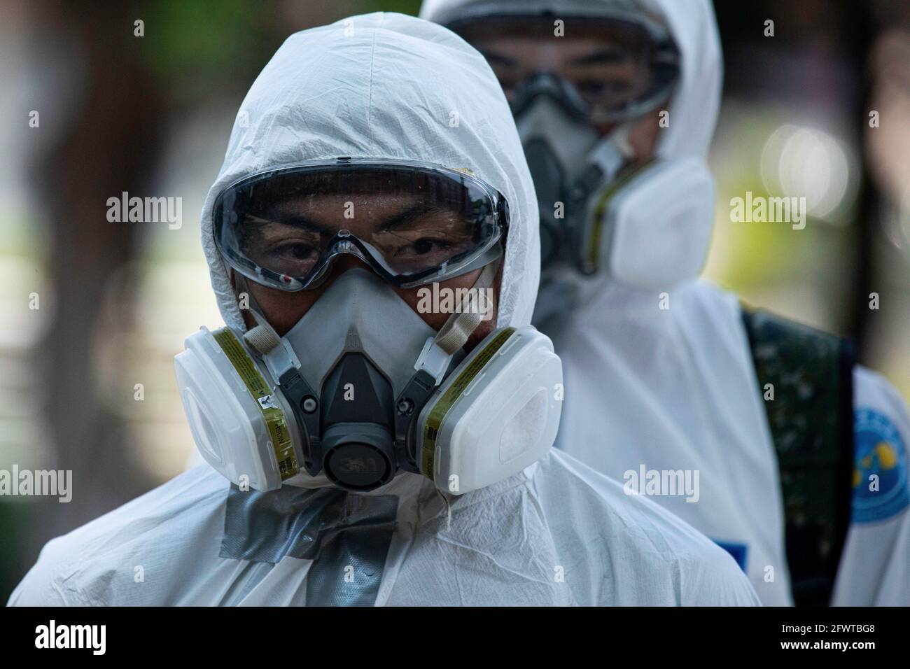 Soldiers from the 33rd Chemical Warfare Group seen dressed in Personal ...