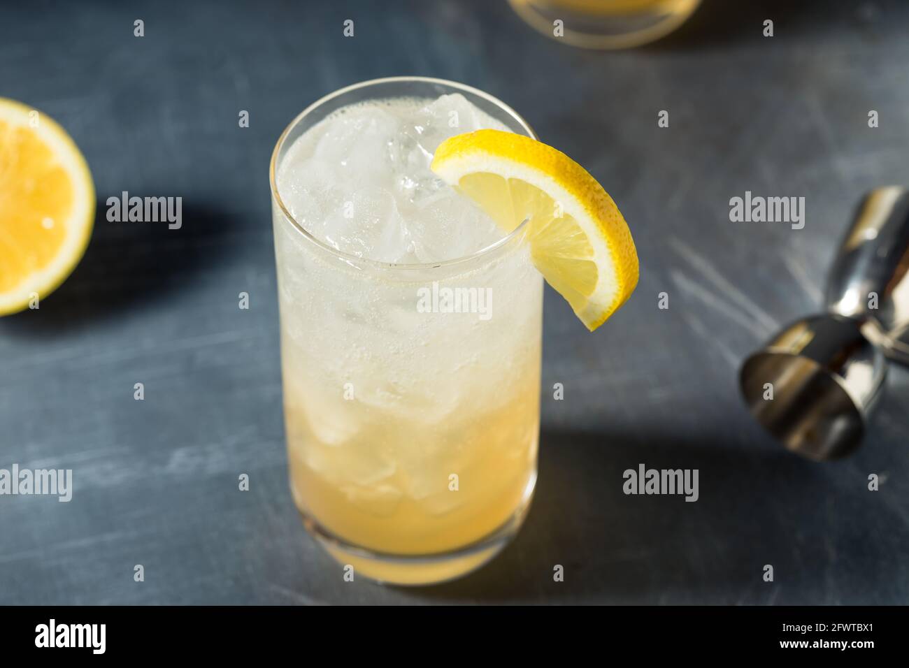 Boozy Refreshing Lemon Rum Collins with Soda Water Stock Photo - Alamy