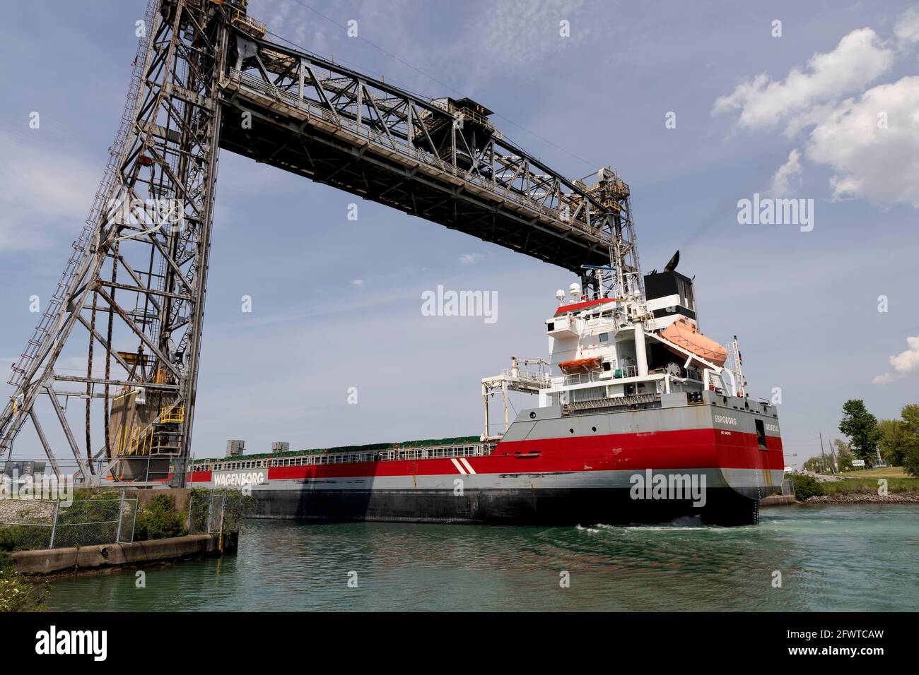 Ship passing under bridge 5, also known as the Glendale Bridge, a ...