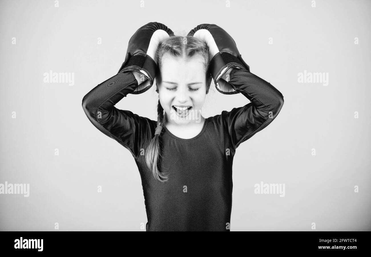 Determined to win. workout of small girl boxer. Happy child sportsman ...