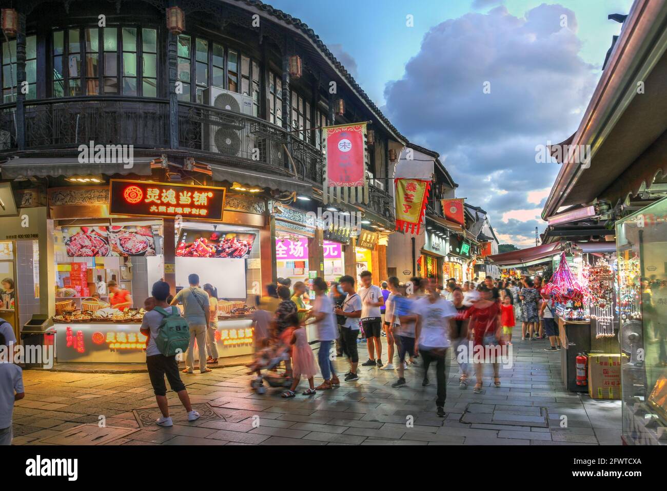 Hangzhou, China - August 3, 2019 - Evening scene along the historical ...