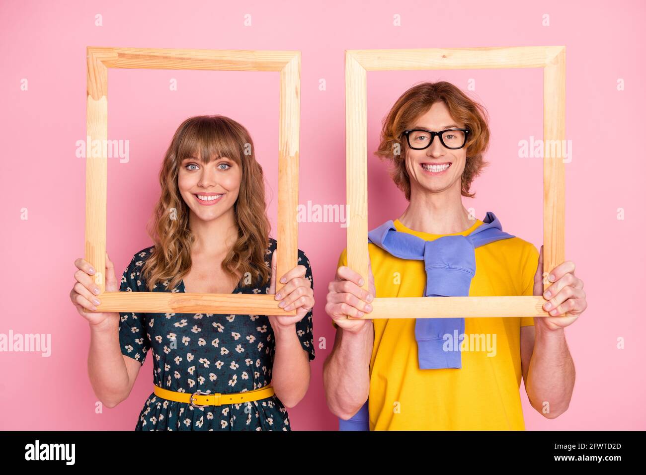 Photo of optimistic nice couple pose in frame wear colorful clothes ...