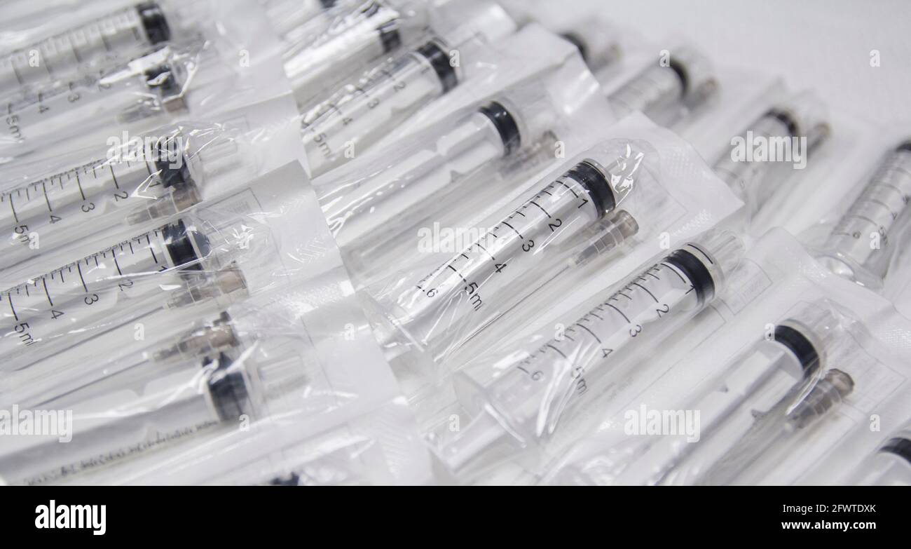 Medical waste, therapeutic syringes in packaging A bunch of unused ...
