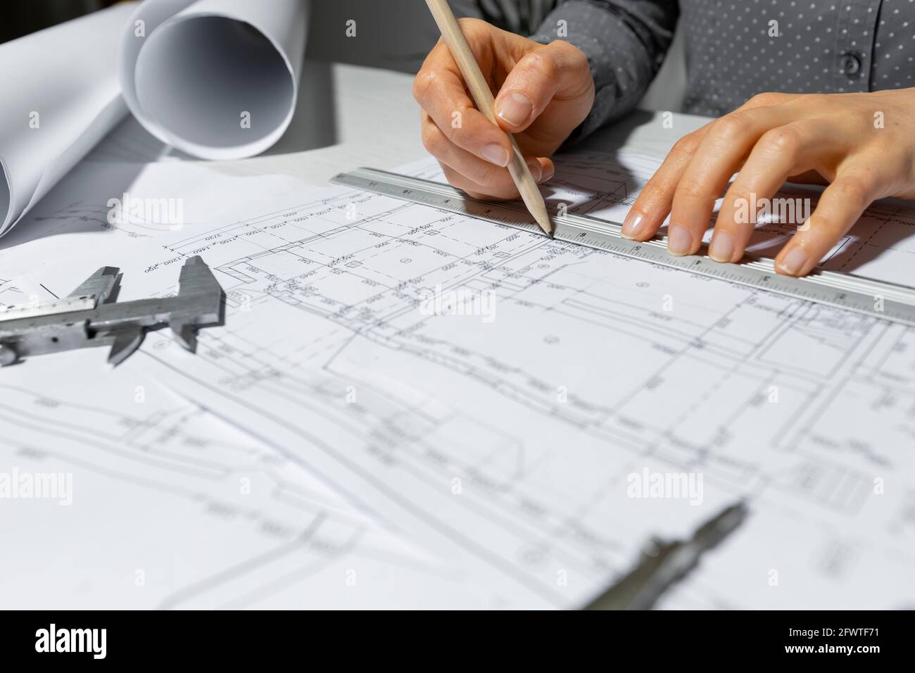 The hands architect draw a sketch of a design project with a pencil ...