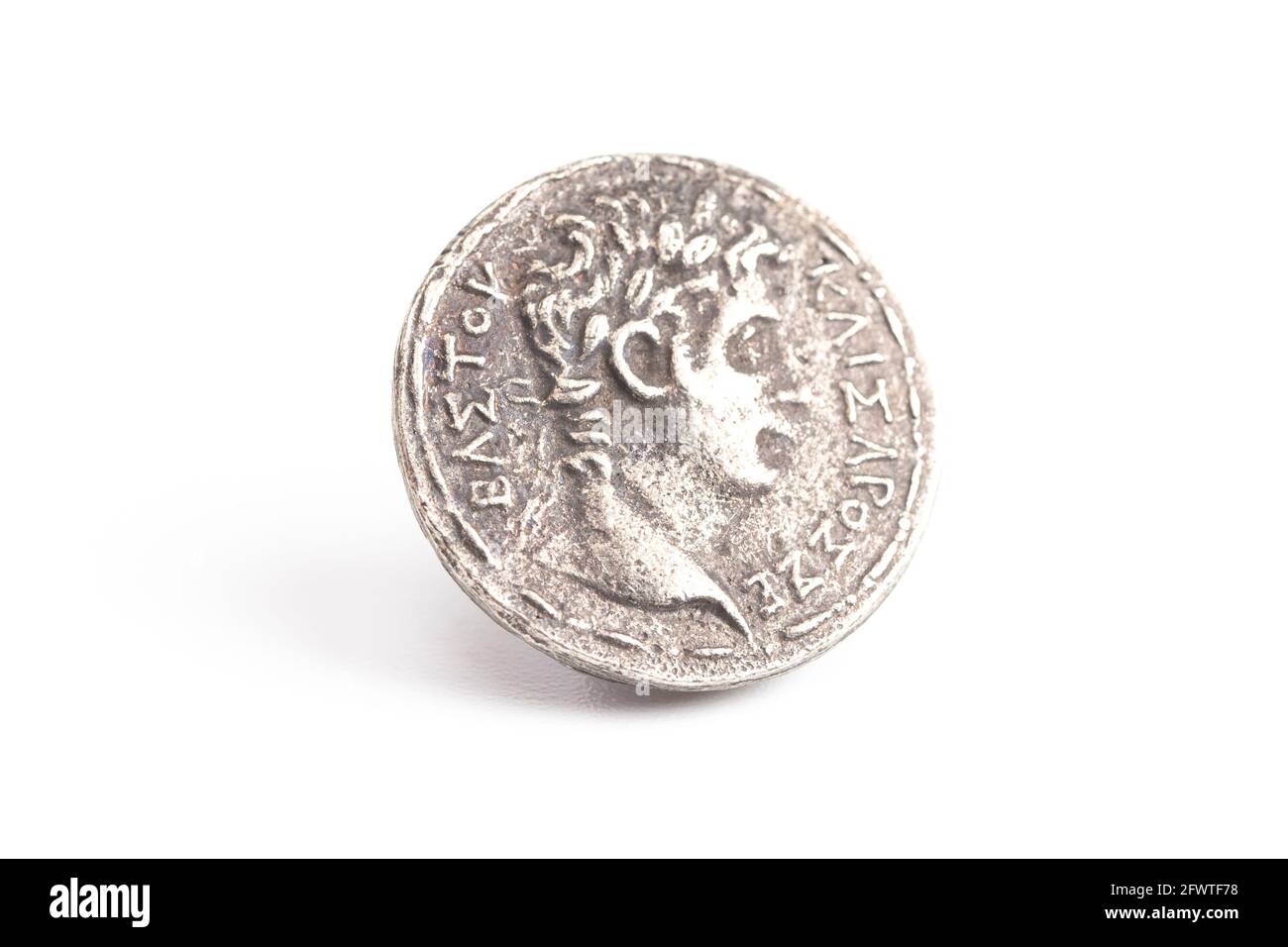 An Ancient Silver Roman Coin Replica Isolated on a White Background ...