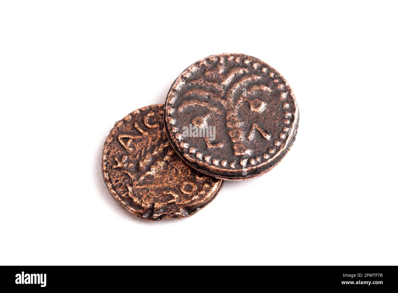 Two Small Copper Coins or Widows Mites Isolated on a White Background ...