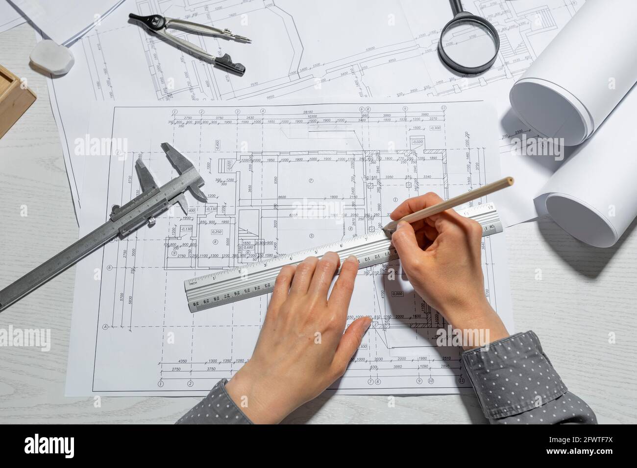 The hands architect draw a sketch of a design project with a pencil ...