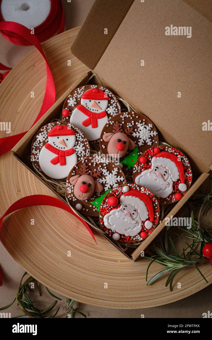 Closeup of the sweet Christmas round chocolate candies with decorations ...