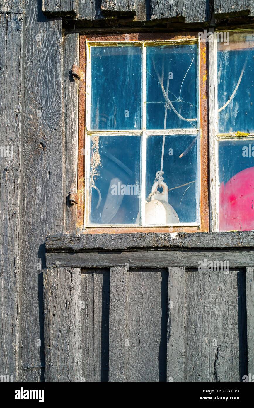 Old window of a fisherman's hut, Suffolk Coast Stock Photo - Alamy