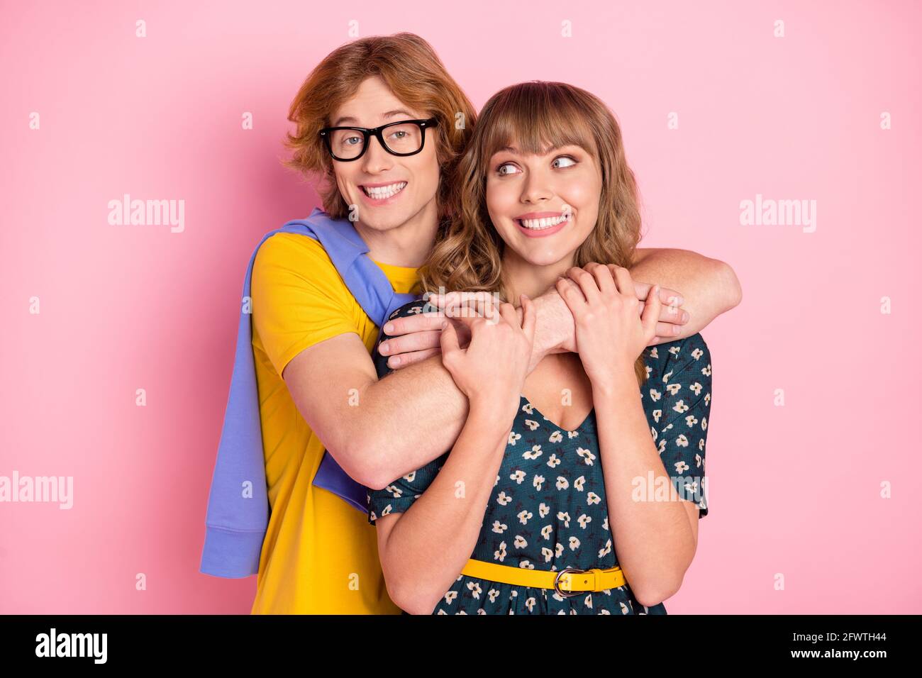 Photo of optimistic nice couple hug wear colorful clothes isolated on ...