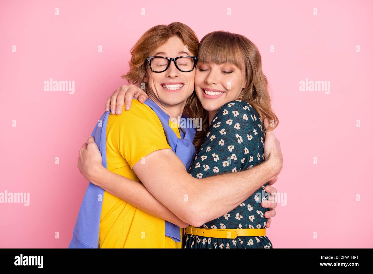 Photo of optimistic nice couple hug wear colorful clothes isolated on ...
