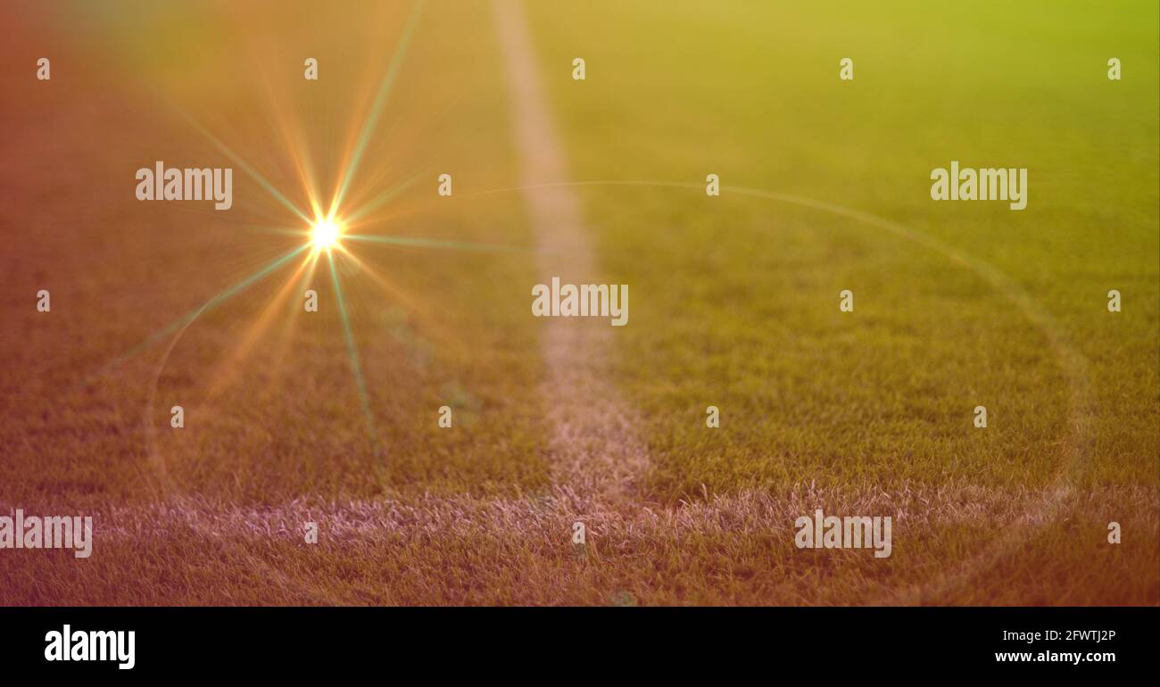 Composition of close up of football stadium over sun Stock Photo - Alamy