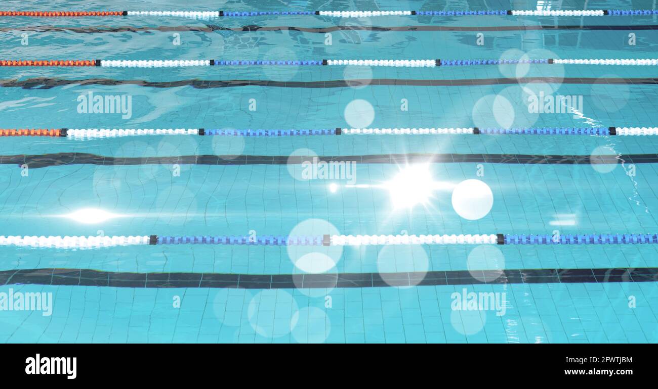 Composition of clean water in swimming pool over light blur Stock Photo ...