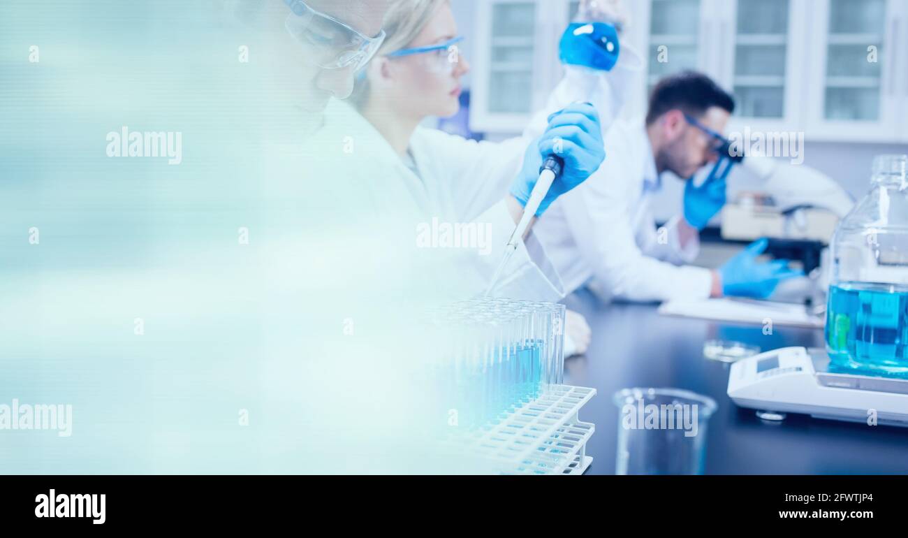 Composition of diverse group of scientists in lab with motion blur ...