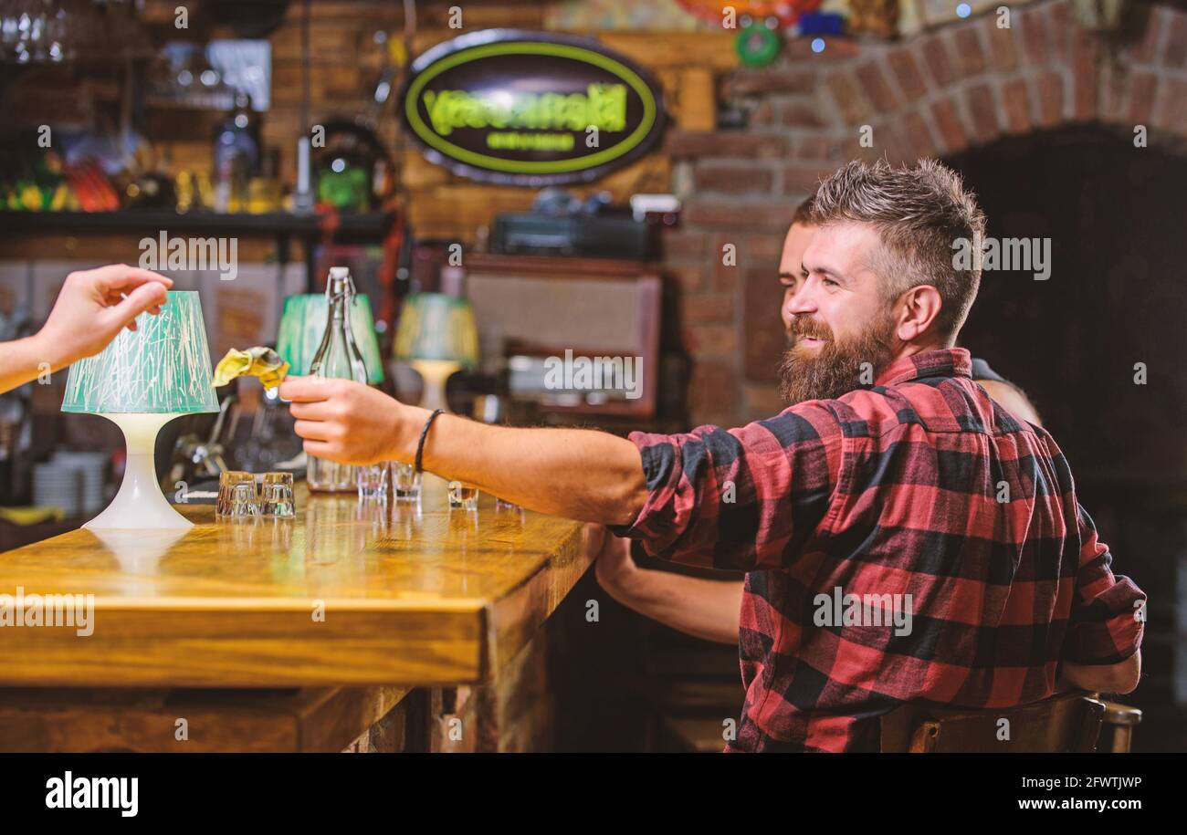 Cash money concept. Leave tips for bartender. Tip given to waiter. One ...