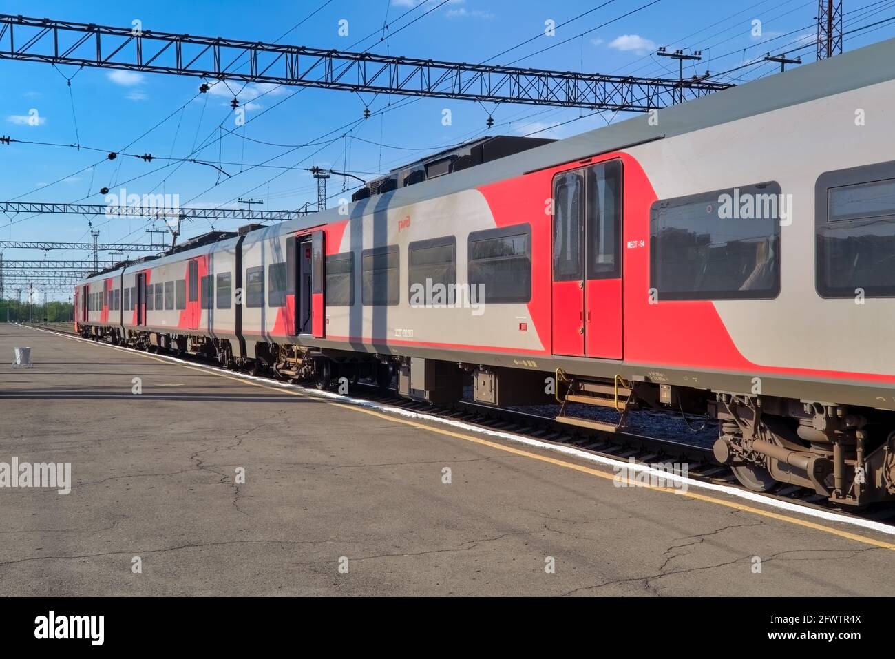 High-speed passenger electric train on the platform. High-speed train ...