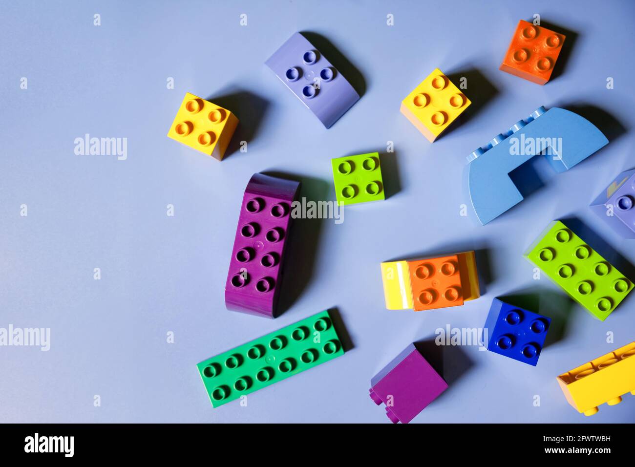 Colorful plastic construction blocks on white background as kids toys ...