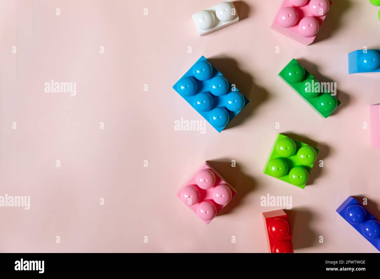 Colorful plastic construction blocks on white background as kids toys ...