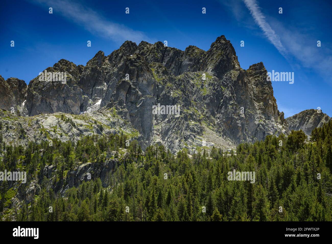 Tossal de la Montanyeta summit, seen from Estany Llong Lake ...