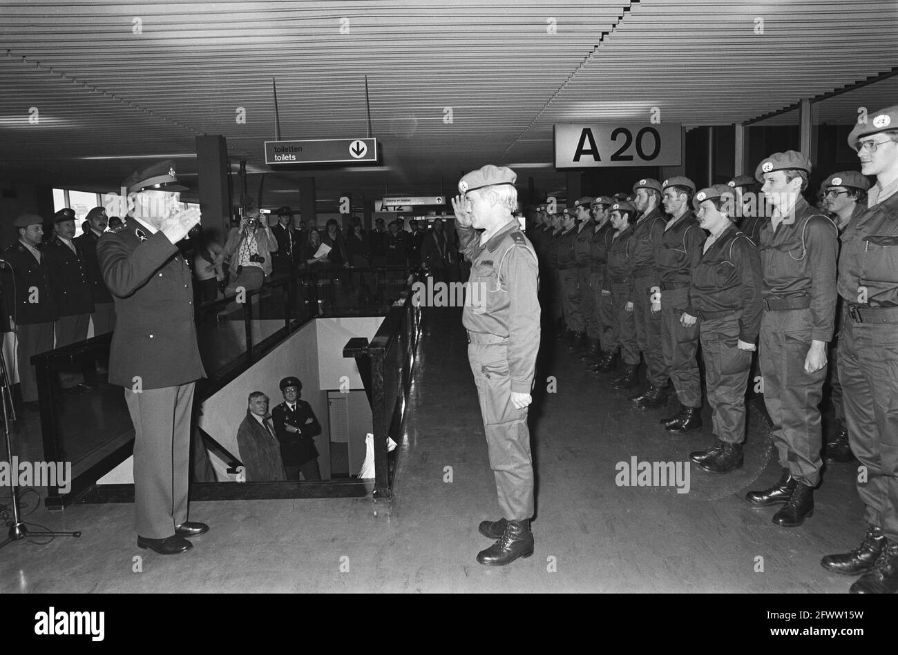 At Schiphol Airport, an officer greets departing Dutchbat soldiers ...