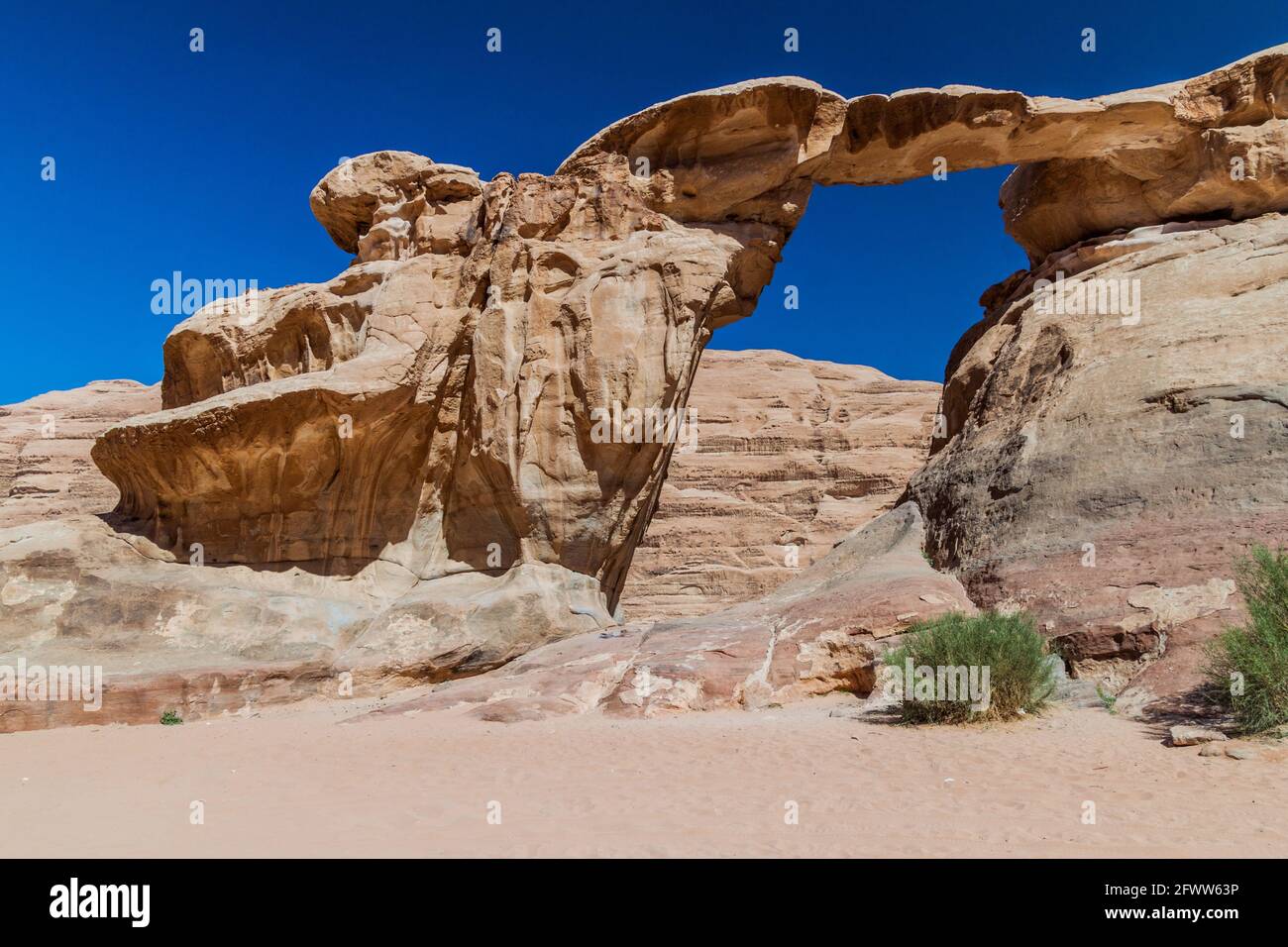 Burdah rock bridge in Wadi Rum desert, Jordan Stock Photo - Alamy