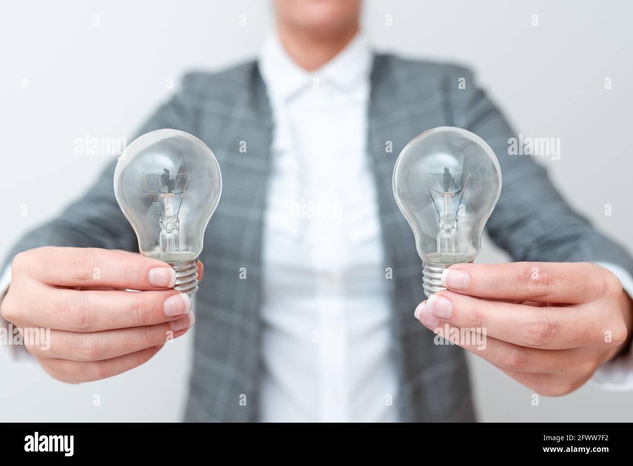 Lamps in two hands hi-res stock photography and images - Alamy