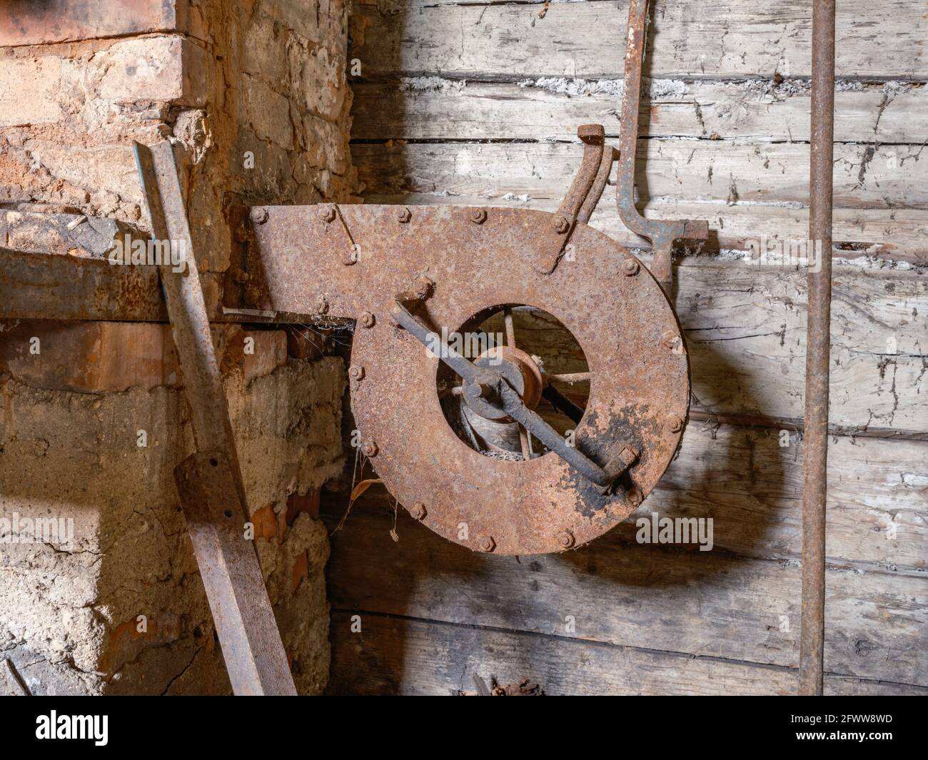 old workshop smith details with rusty tools and stone walls covered in ...