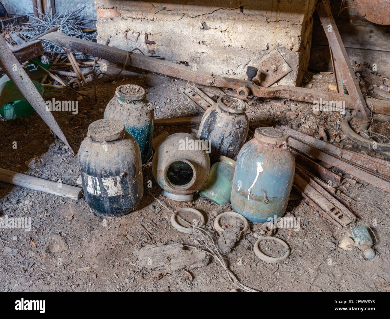 old workshop smith details with rusty tools and stone walls covered in ...