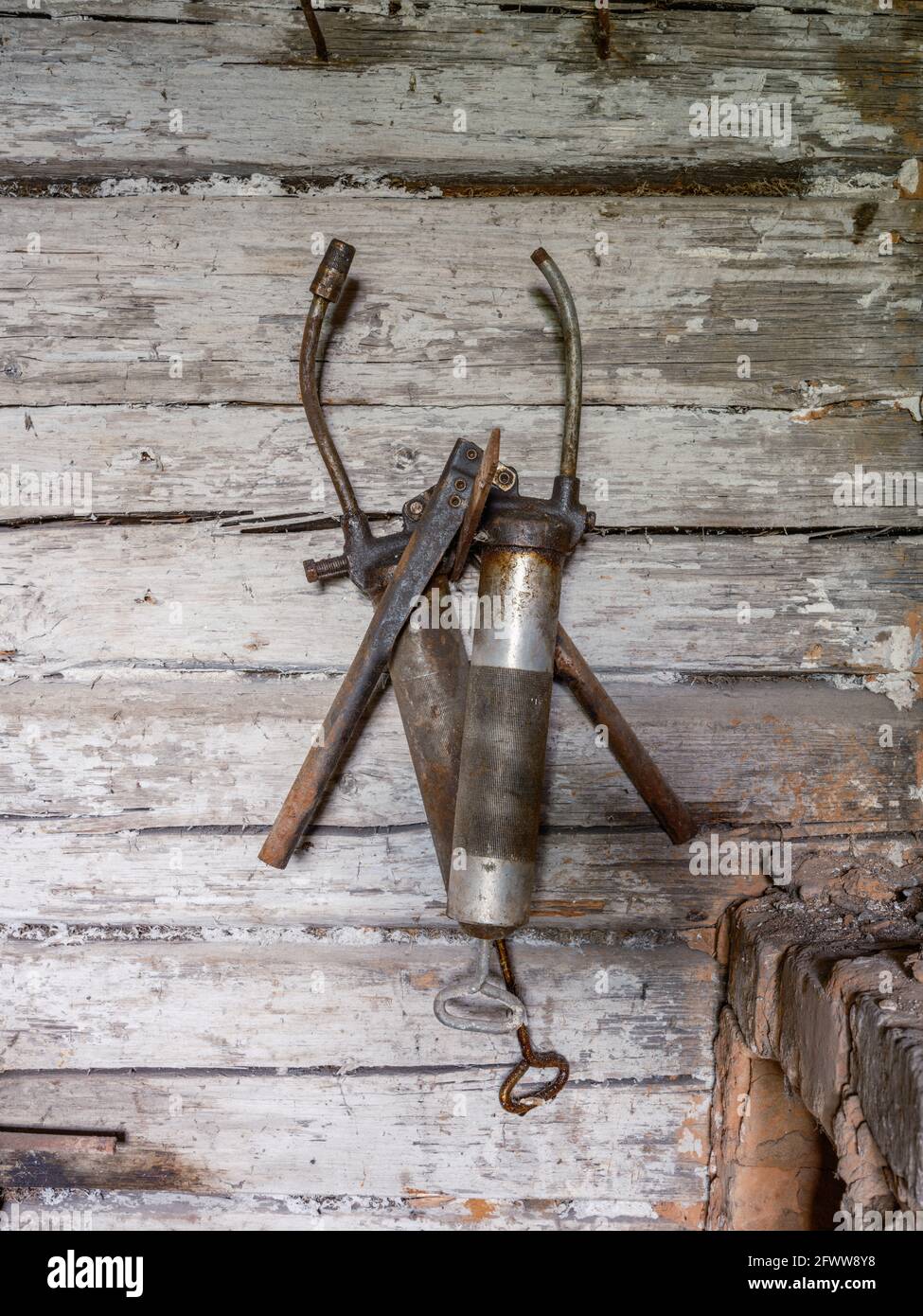 old workshop smith details with rusty tools and stone walls covered in ...