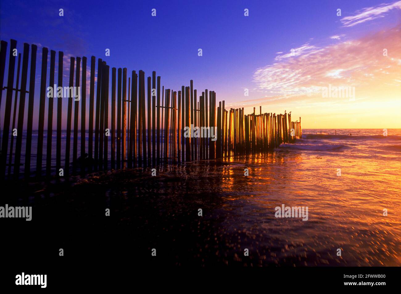 U.S. - Mexico Border Fence at the Pacific Ocean Stock Photo - Alamy