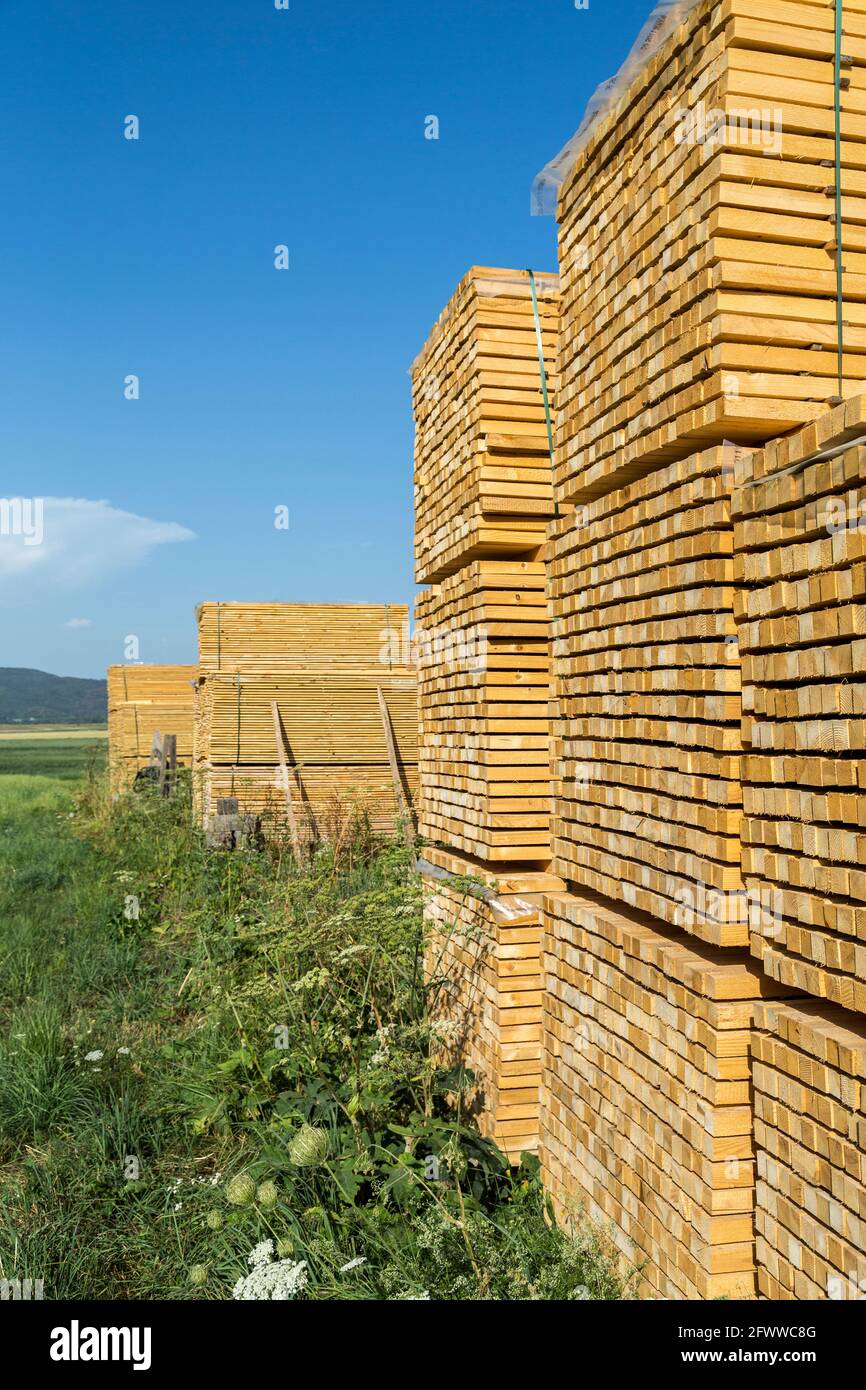 Sawn and planed stacked timber in sawmill yard, Cerknica, Slovenia ...