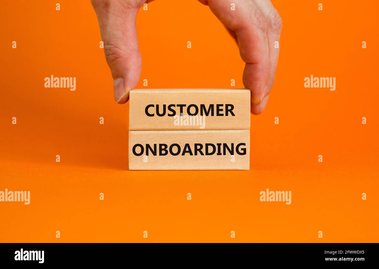 Customer onboarding success symbol. Wooden blocks with words 'Customer ...
