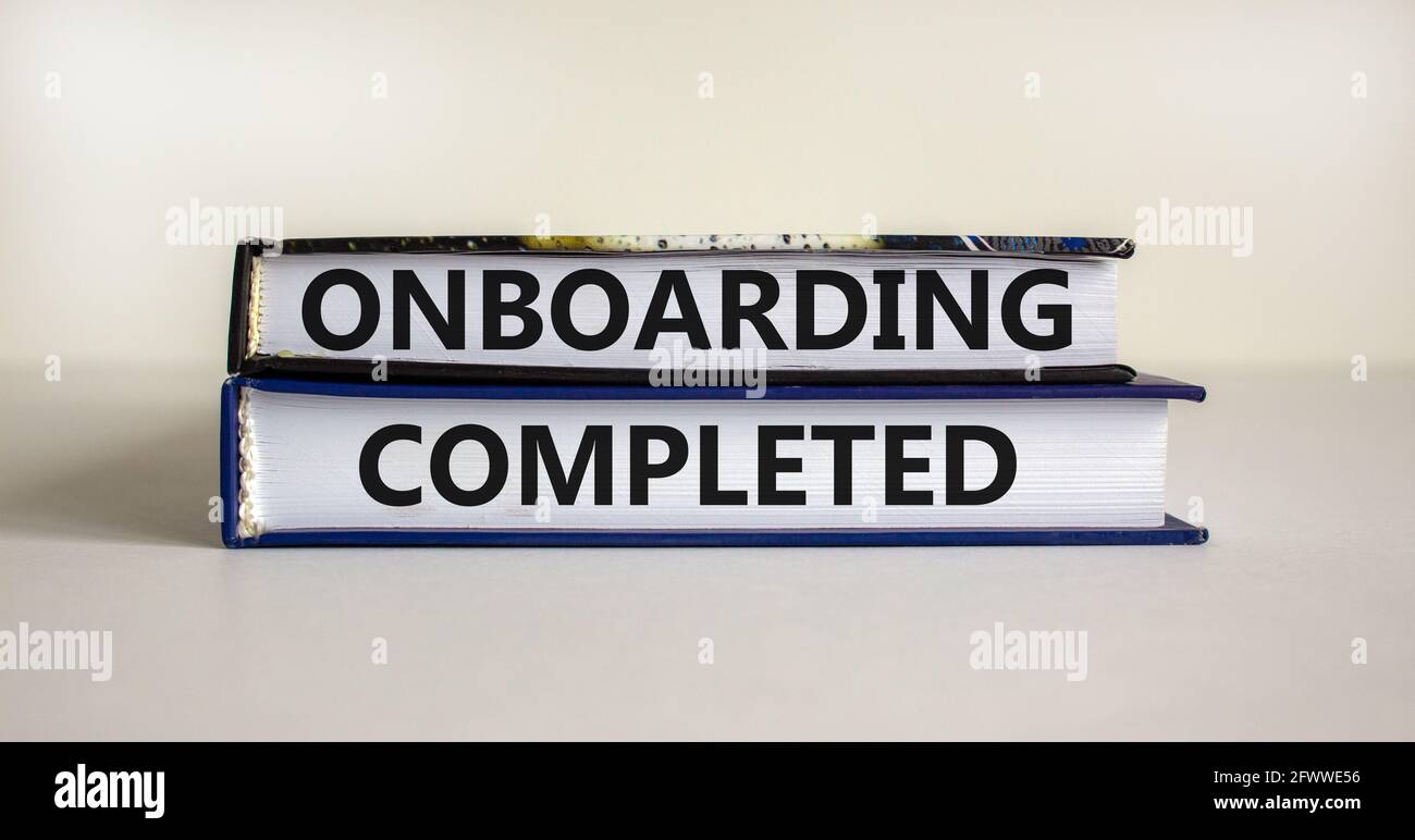 Onboarding completed symbol. Books with words 'Onboarding completed ...